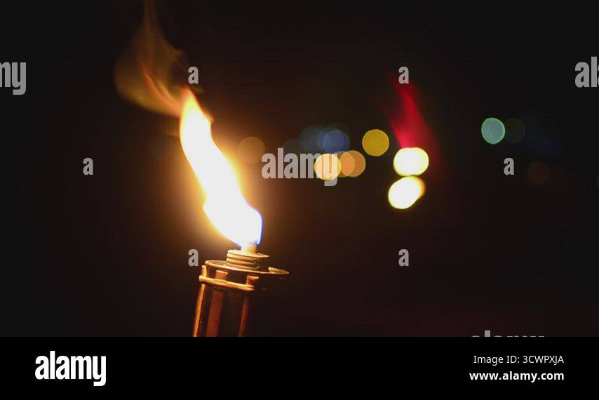 Torchlight firewall with bokeh lights background. Burning gas, flaming ...