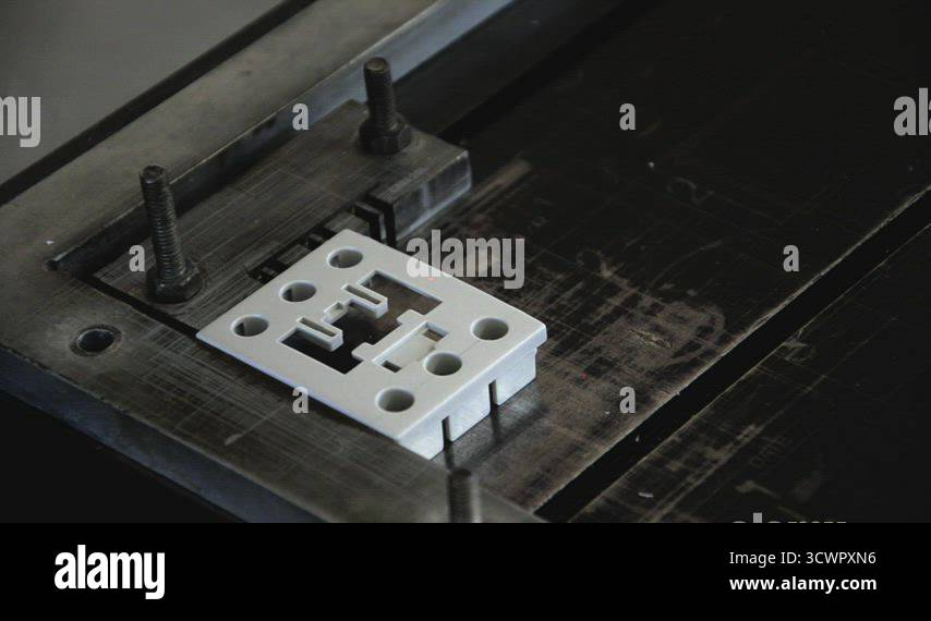 Electric industry laser marking. Industry laser write a random text ...