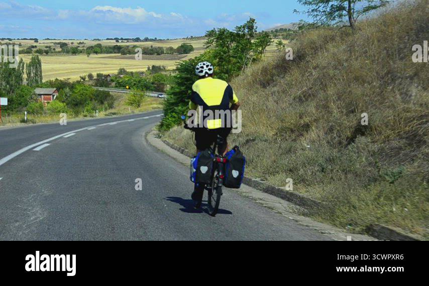 HD: Bicycle Traveler Downhill Cycling - Stock Video. HD1080: Road biker ...