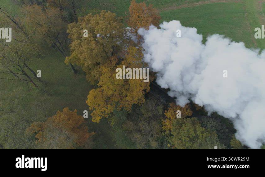 Over head view of an antique restored steam locomotive traveling thru ...
