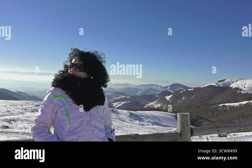 4k happy women facing camera and enjoying winter day. snow landscape at ...