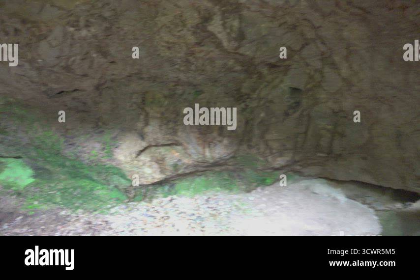 Exploring dark underground caves. Geologists, explorers, adventurers ...