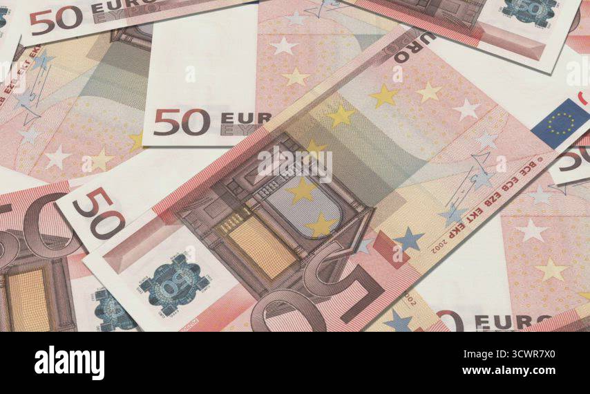 50 euro banknotes in a row. European Union Currency. Stack of 50 euro ...