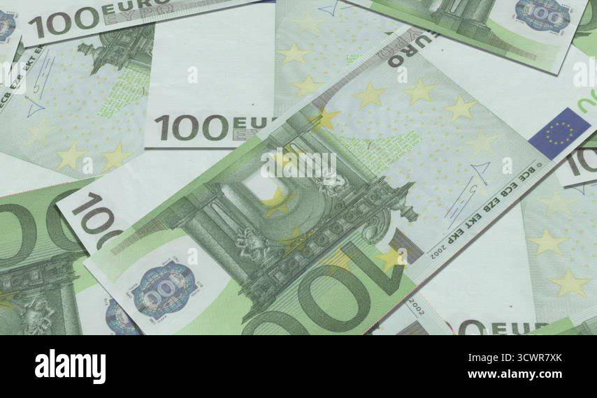 100 euro banknotes in a row. European Union Currency. Stack of 100 euro ...