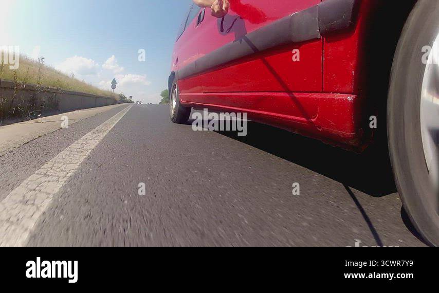 Low angle side view car Stock Videos & Footage - HD and 4K Video Clips ...