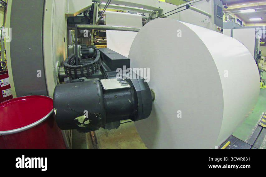 4k Roll of paper change timelapse in a paper factory. UHD stock video ...