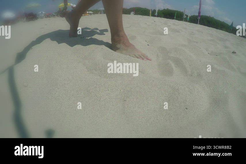 Walking on sand 4k Stock Videos & Footage - HD and 4K Video Clips - Alamy
