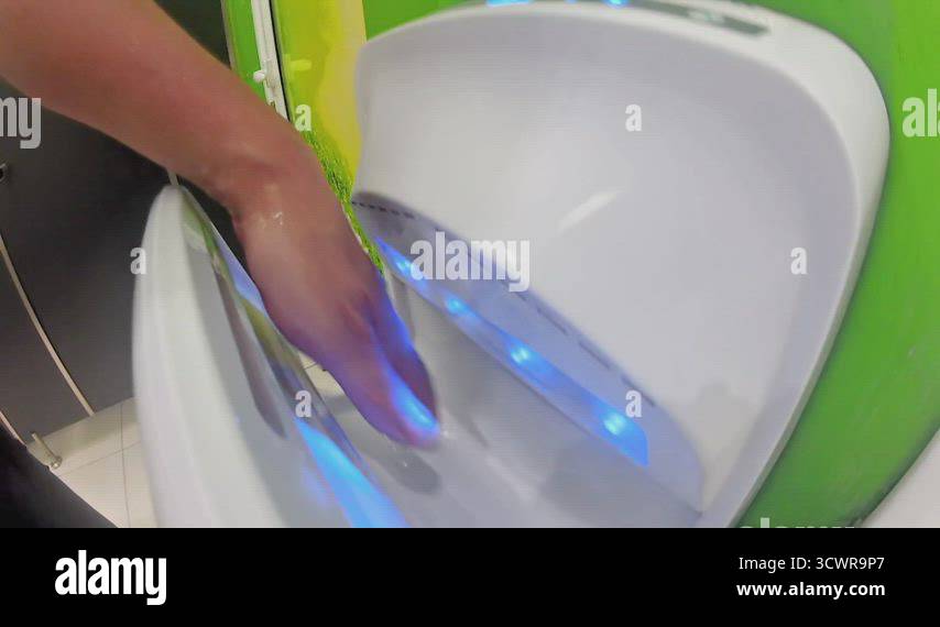 man dry hands on modern hand dryer in toilet Stock Video Footage - Alamy
