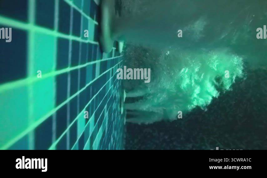 Pool water jet underwater jacuzzi spa, background loop. SLOW MOTION ...