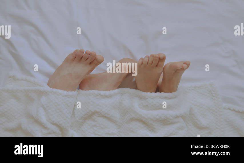 Top view couple legs under Stock Videos & Footage - HD and 4K Video ...