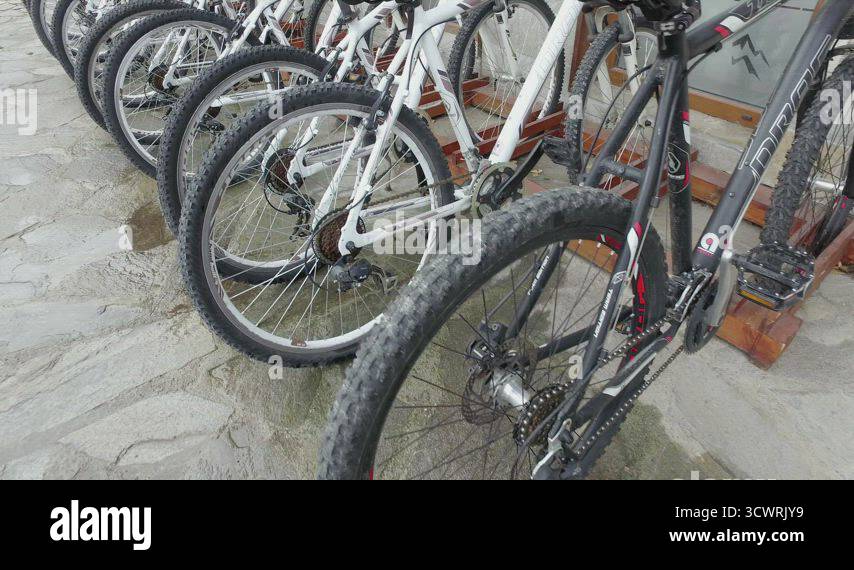 BANSKO, BULGARIA - 12 DEC, 2016: Row of mountain bikes available to rent, bike is popular ...