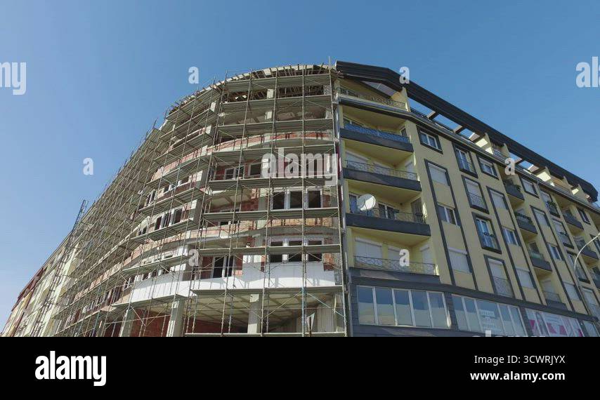 Construction site, residental building facade work, metal construction ...