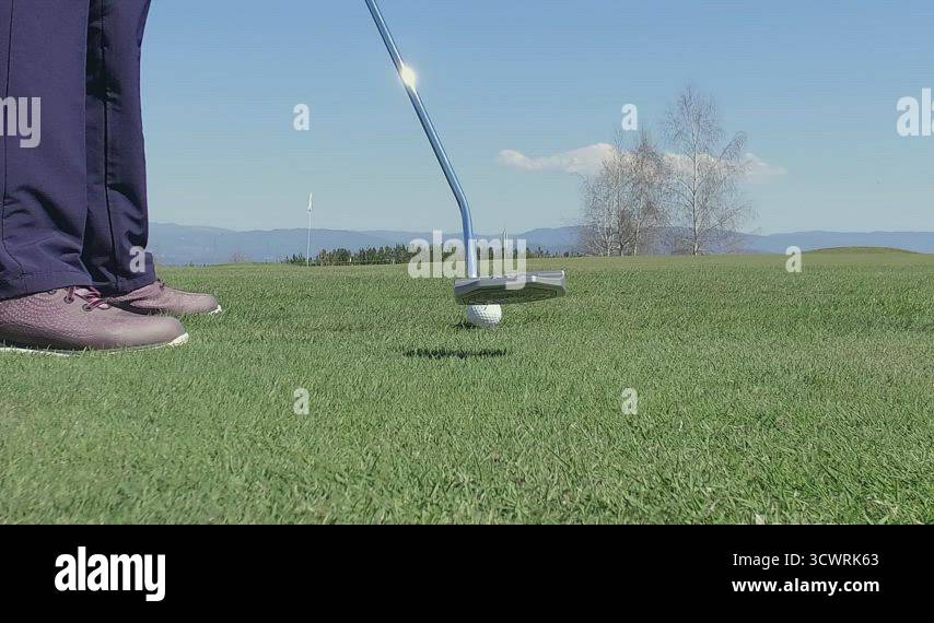 Golfer hit ball on golf course, SLOW MOTION Stock Video Footage - Alamy