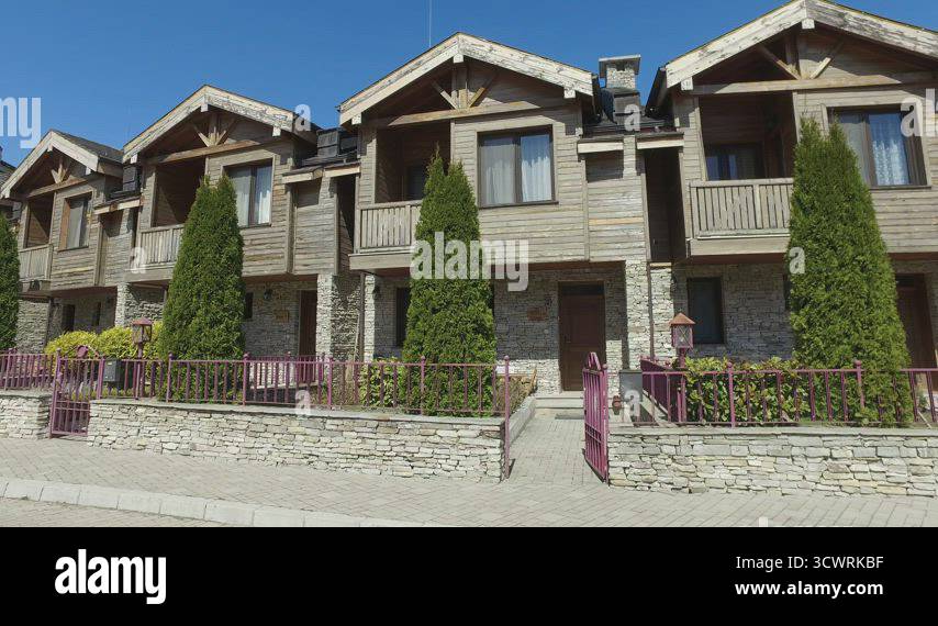 small stone two story European cottage foreign house neighbourhood ...