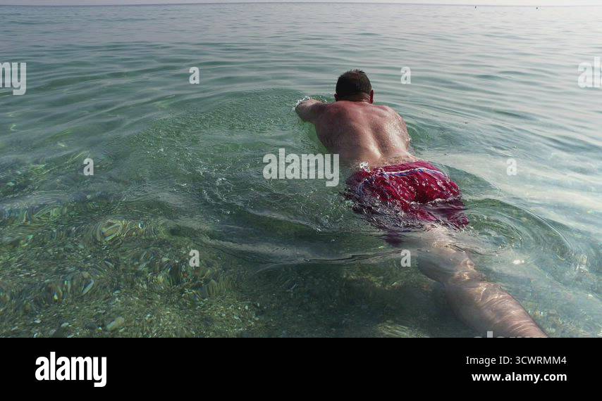 Professional swimmer swimming crawl outdoor Stock Videos & Footage - HD ...