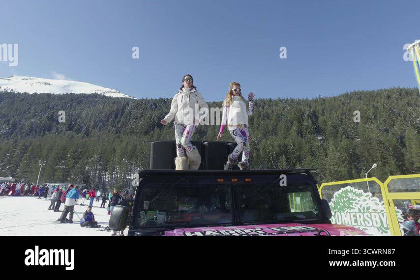 BANSKO, BULGARIA - circa FEB, 2017: Ski girls dance at party at world ...
