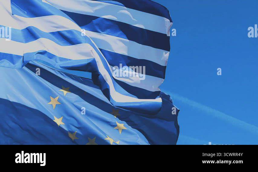 Greek and European Union flags and blue sky on a windy day, travel and ...