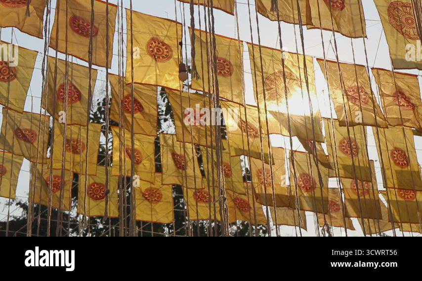 Thai public temple pray merit ceremony flags Stock Video Footage - Alamy