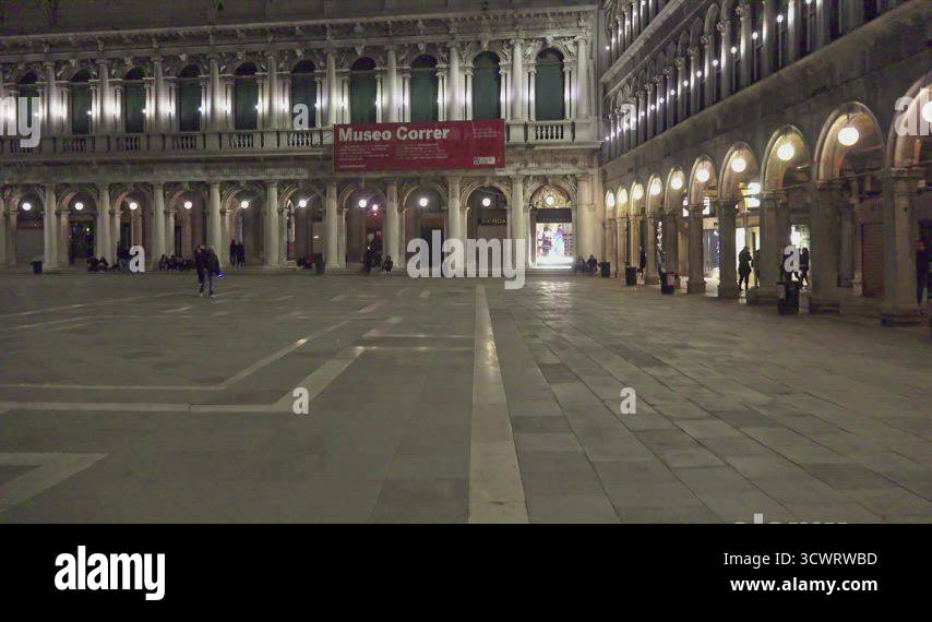 VENICE, ITALY - circa APRIL, 2015: Night view of Tourist POV walking on ...