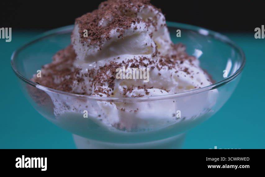 ice cream with chocolate flakes served in rosette Stock Video Footage - Alamy