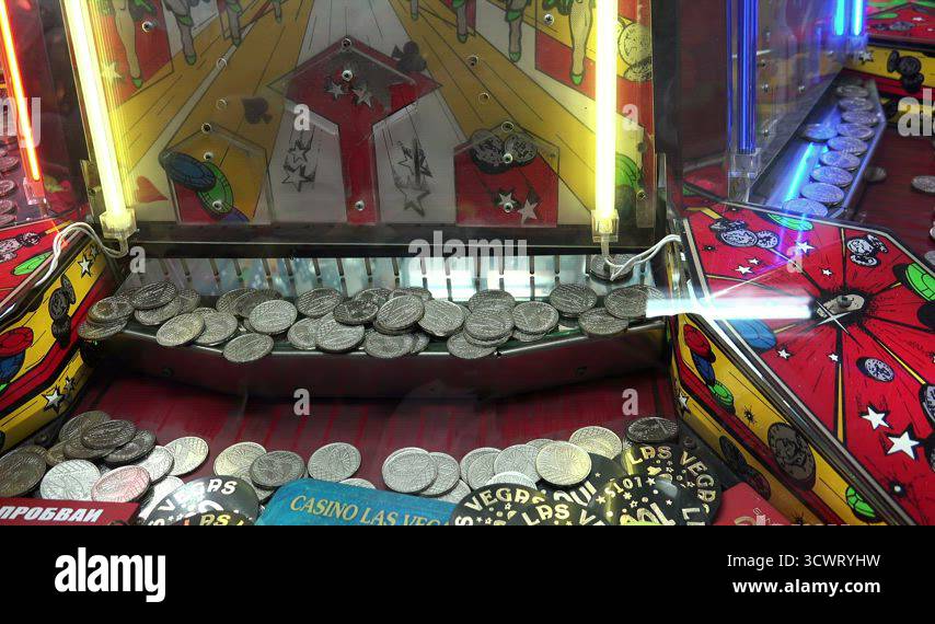 Penny pusher falls Stock Videos & Footage - HD and 4K Video Clips - Alamy