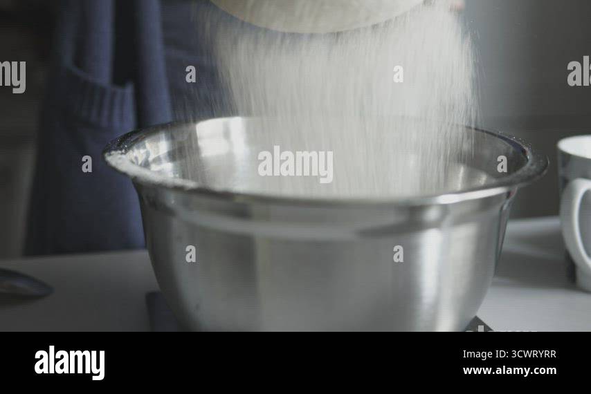 Sieving flour bowl Stock Videos & Footage - HD and 4K Video Clips - Alamy