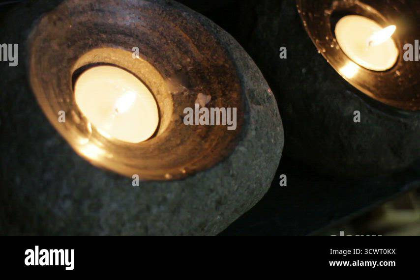 Moving scented candles flame in the wind Stock Video Footage - Alamy
