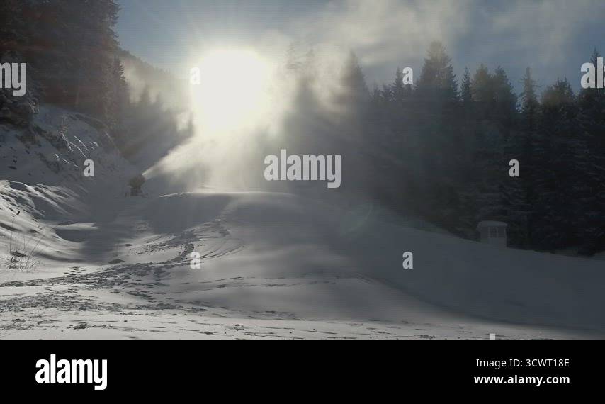 Large snow gun generates artificial snow on ski slope, SLOW MOTION ...