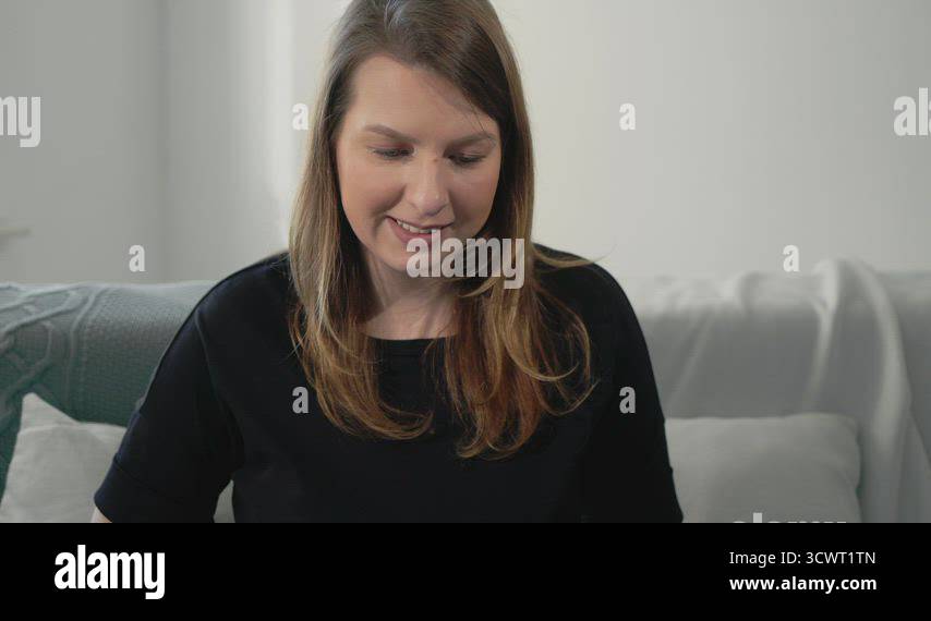Young woman working remotely at home with computer laptop. Covid-19 ...