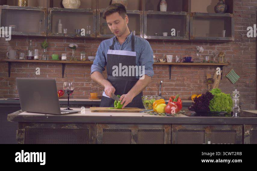 Boyfriend using internet cook lunch for family Stock Video Footage - Alamy