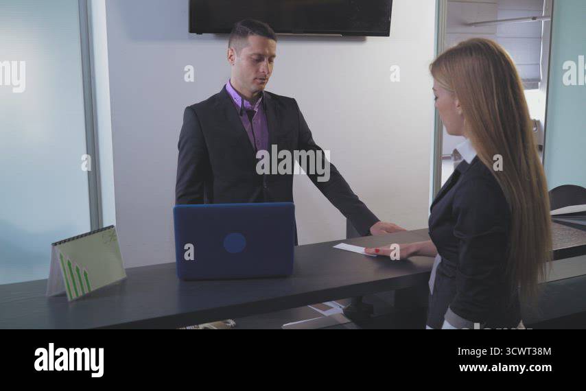 Bank clerk conducts a financial transaction Stock Video Footage - Alamy