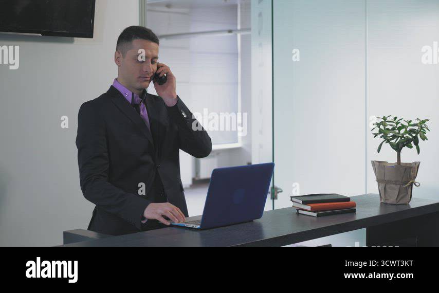 Male secretary desk reception Stock Videos & Footage - HD and 4K Video ...