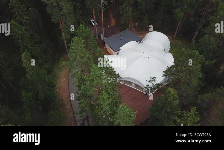 Tent restaurant for a holiday in the forest. Country white tent. Aerial ...