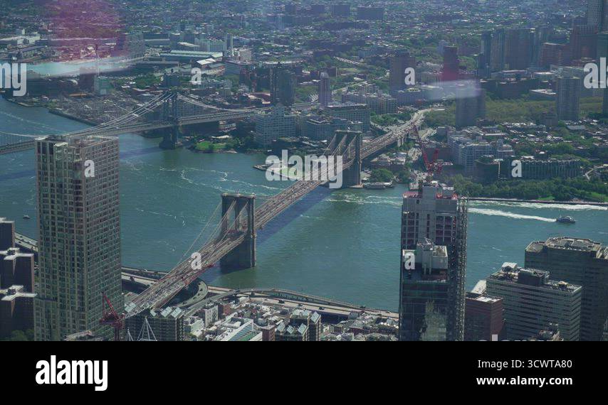 Aerial view at New York city. Downtown, Hudson Bay, the Brooklyn bridge ...