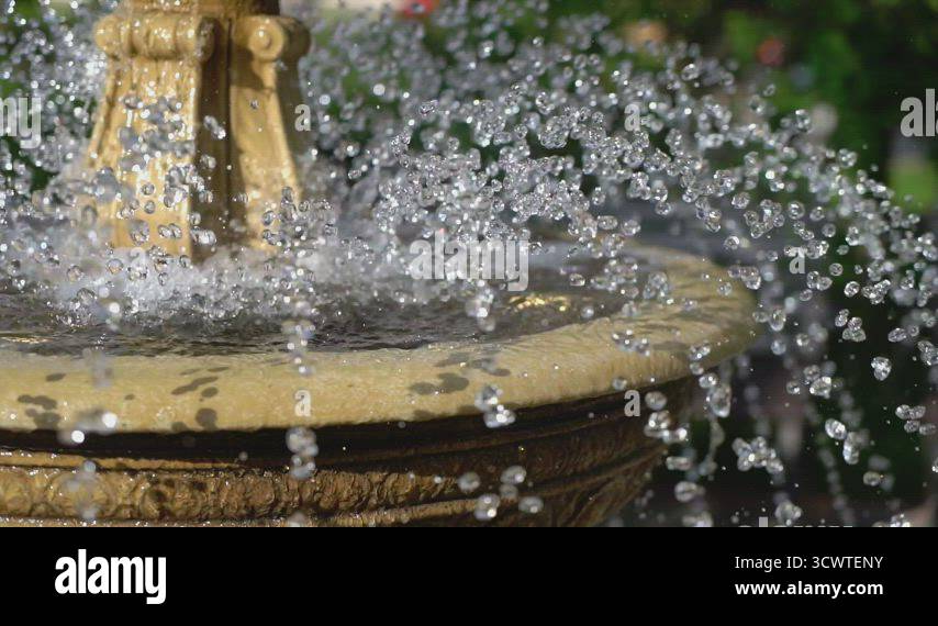 Fountain sparkling in a summer day Stock Video Footage - Alamy
