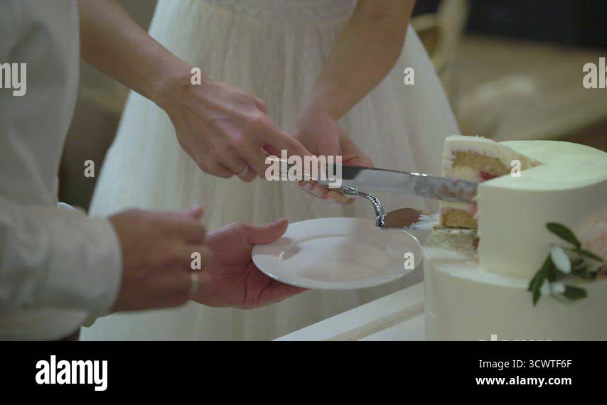 Wedding cake. Traditional celebration dessert at the party. Bride and ...