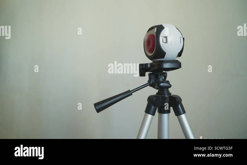 Laser Level measuring tool with visible red laser beam crossing Stock ...