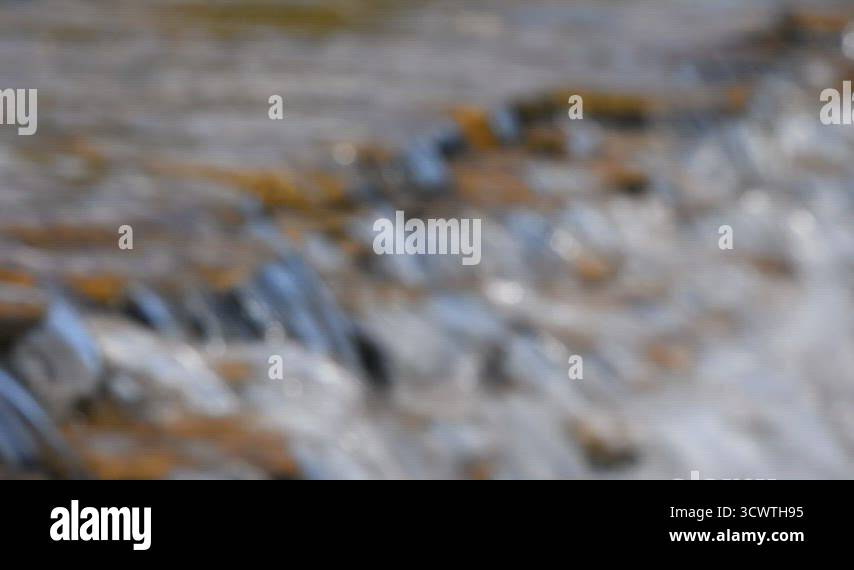 Brook water stream with small rift Stock Video Footage - Alamy