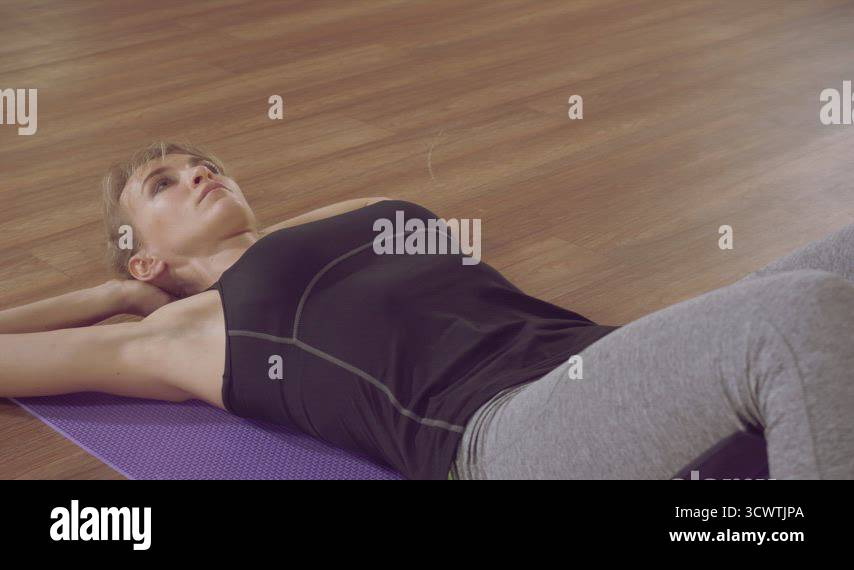 closeup woman fitness exercise for beauty abs Stock Video Footage - Alamy
