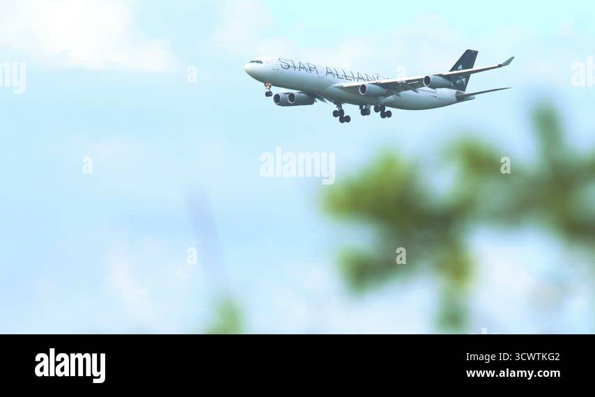 Airbus A340 is approached to airport Stock Video Footage - Alamy