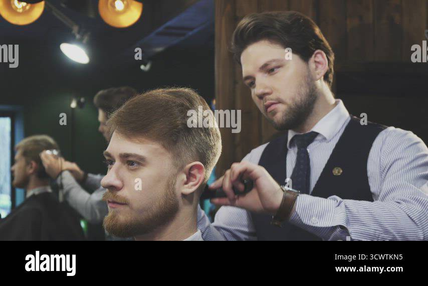 Professional barber working giving haircut Stock Videos & Footage - HD ...