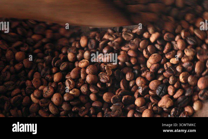robusta coffee bean roasted in old tradition Stock Video Footage - Alamy