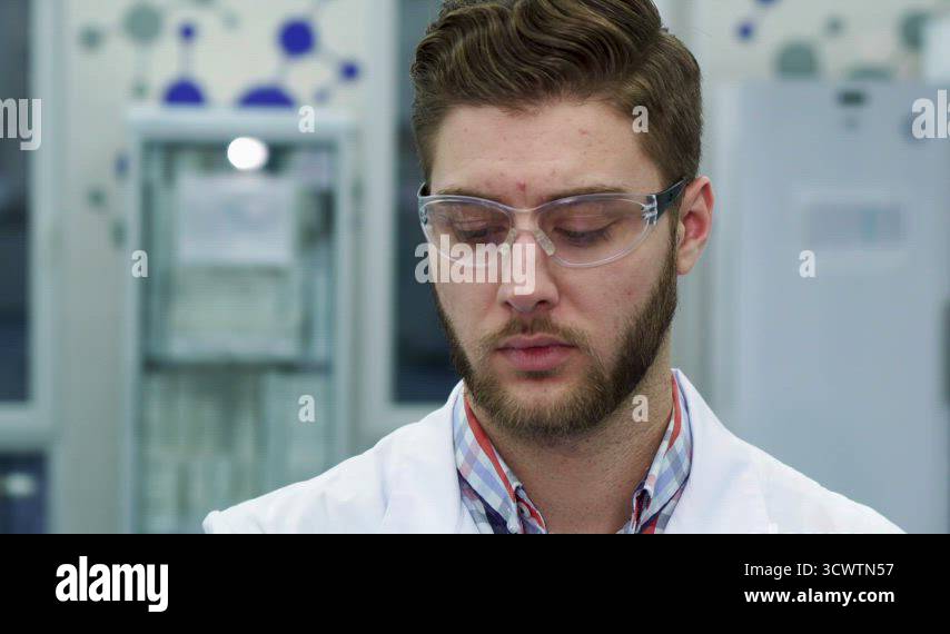 Man in laboratory looking on Stock Videos & Footage - HD and 4K Video ...