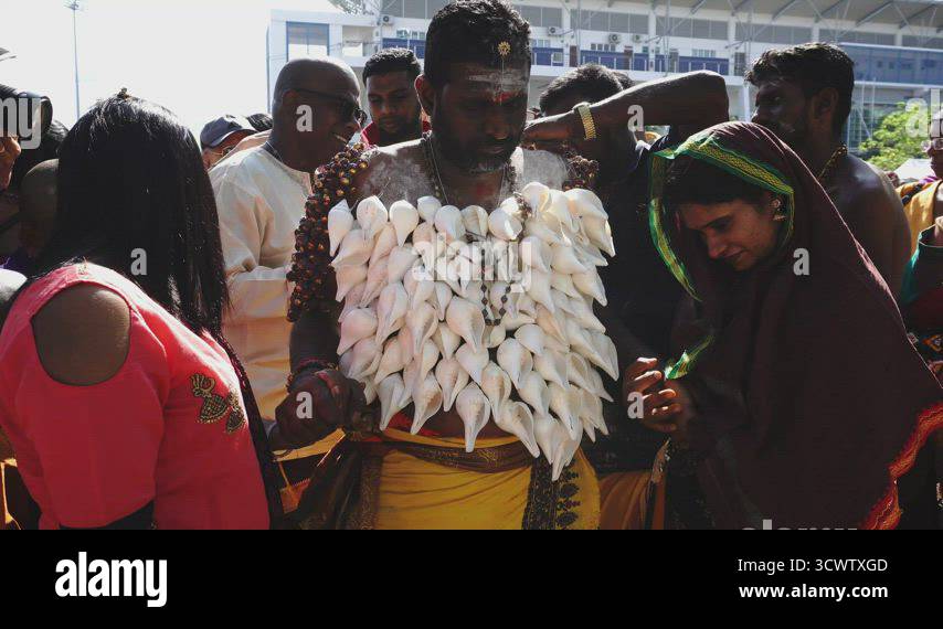 Body piercing and the hand hold by family to thank blessing from God ...