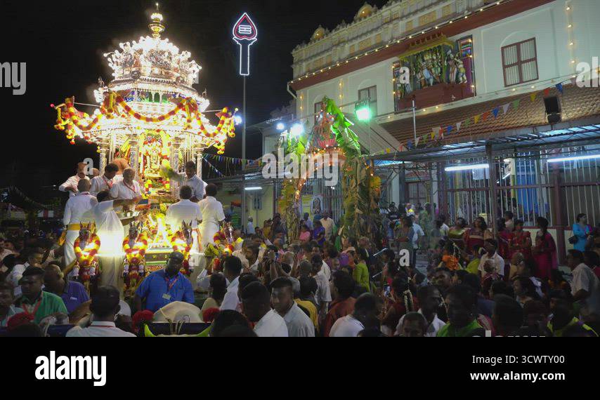 Silver chariot start procession at Nattukkottai Chettiar Temple Stock ...