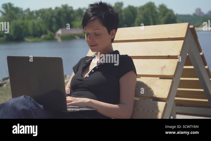 Happy girl working on computer Stock Video Footage - Alamy