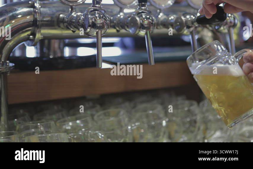 Freshly tapped beer Stock Video Footage - Alamy