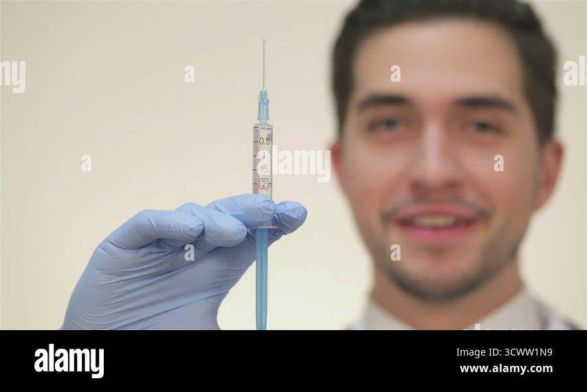 Medical worker preparing to give an injection Stock Video Footage - Alamy