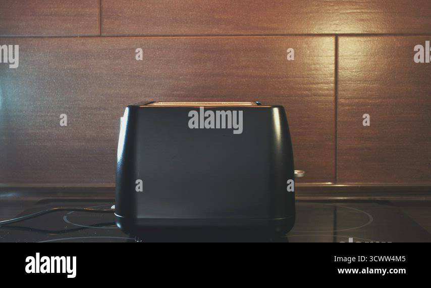 Toast bread popping out from toaster Stock Video Footage - Alamy