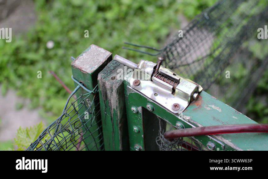 Lock Shutter In The Wooden Door Stock Video Footage - Alamy